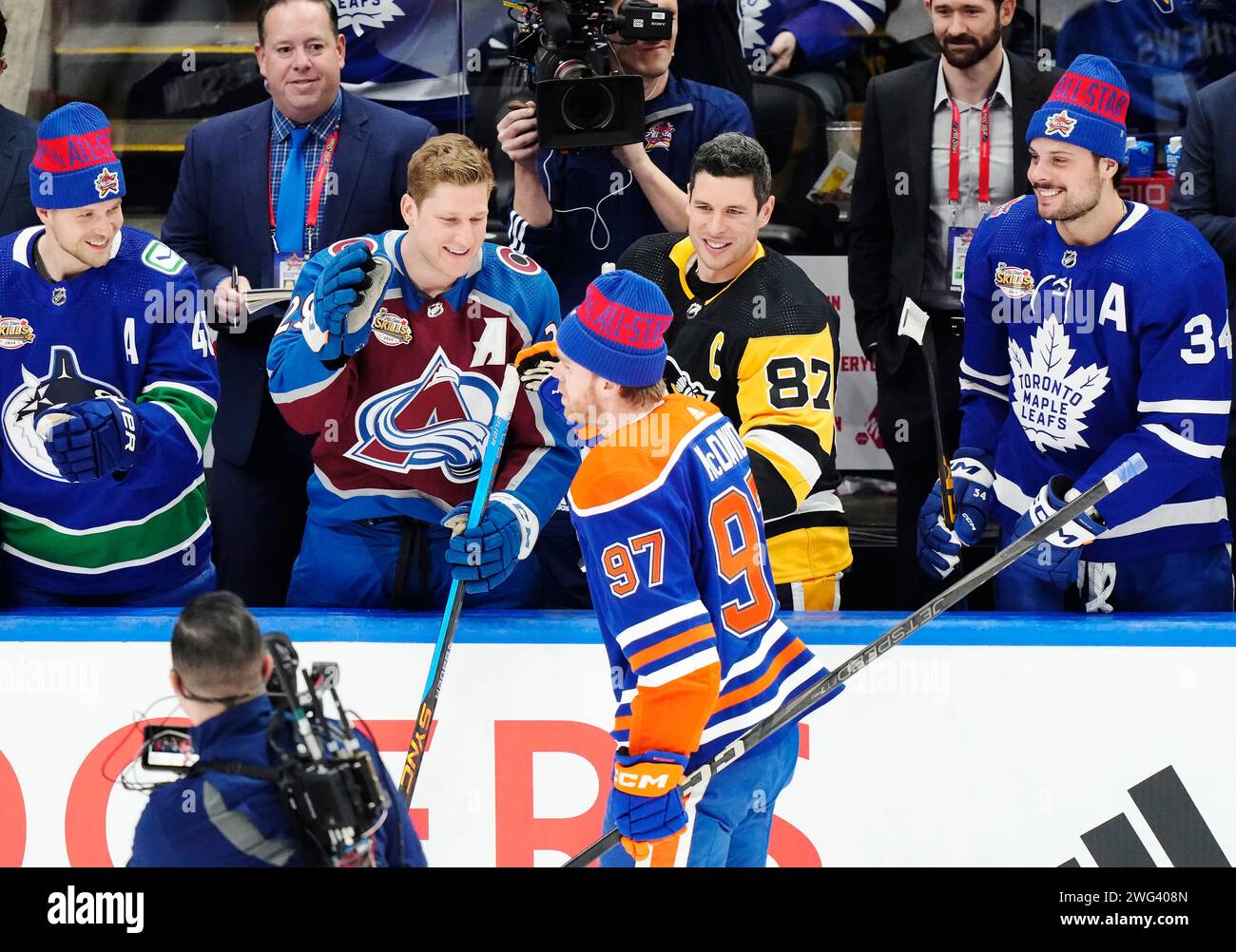 Edmonton Oilers' Connor McDavid is congratulated by Vancouver Canucks ...