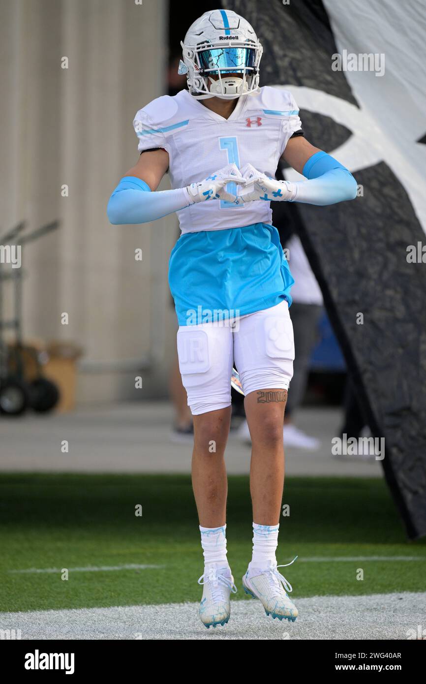 Team Ice defensive back Aaron Scott Jr. (1) runs onto the field during ...