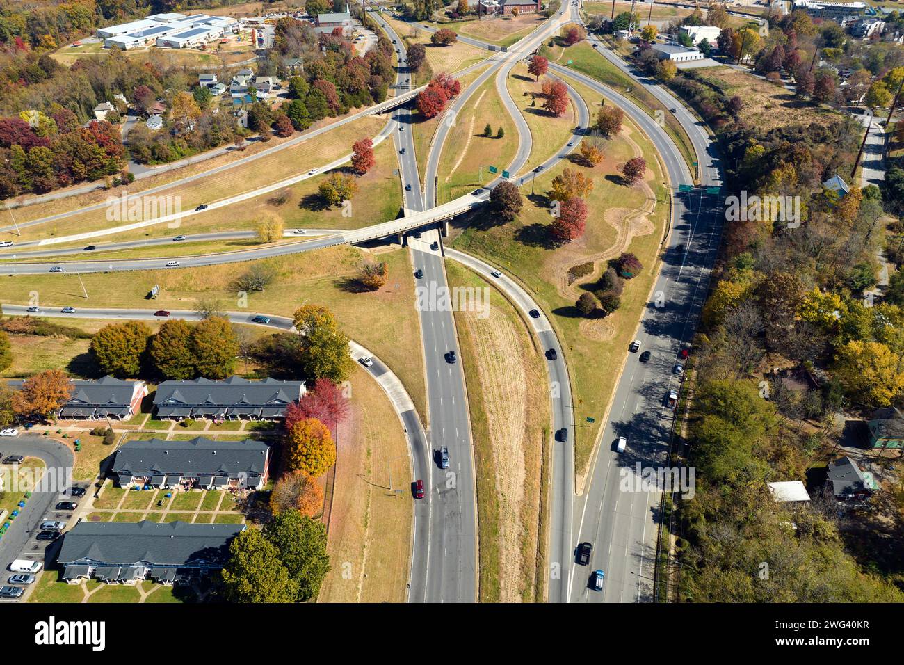 Aerial view of american freeway intersection with fast moving cars and ...