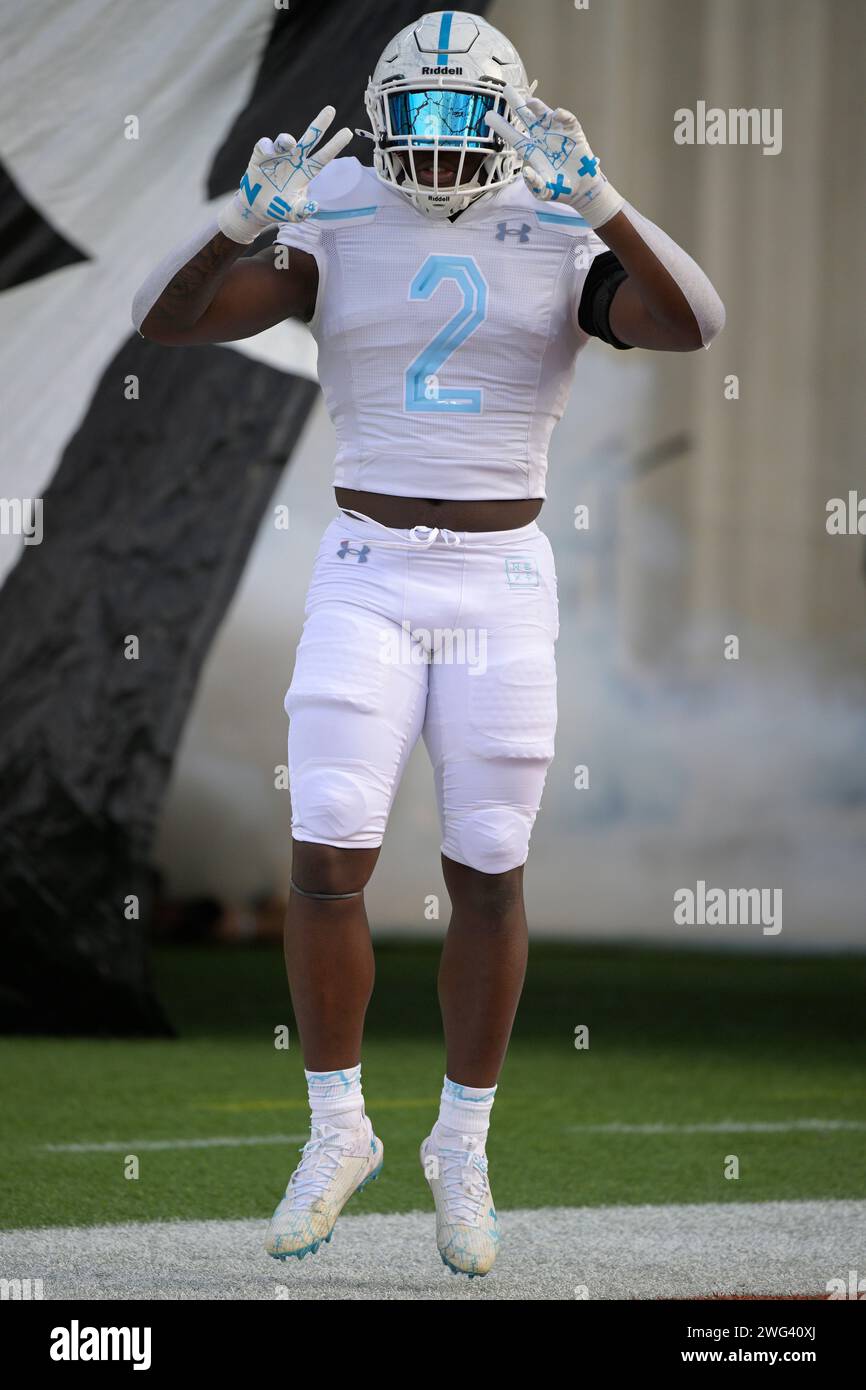 Team Ice running back Jerrick Gibson (2) runs onto the field during ...
