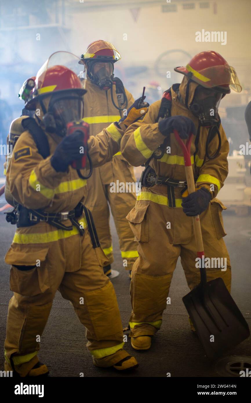 240131-N-VR794-1260 SAN DIEGO (Jan. 31, 2024) – Sailors use a naval ...