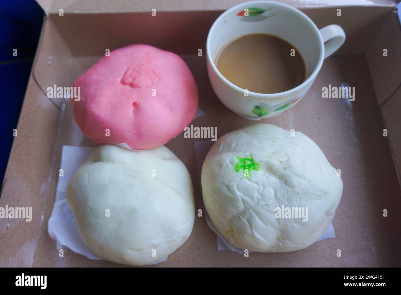a piece of steamed bun in the morning with a cup of hot coffee Stock ...