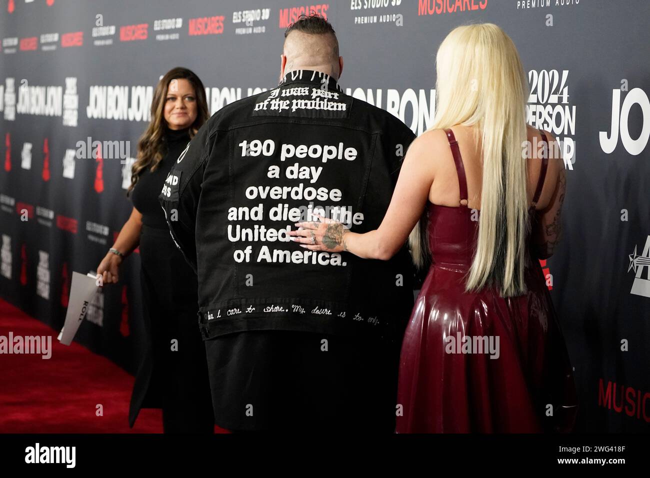 Jelly Roll, left, and Alyssa DeFord arrive at MusiCares Person of the ...