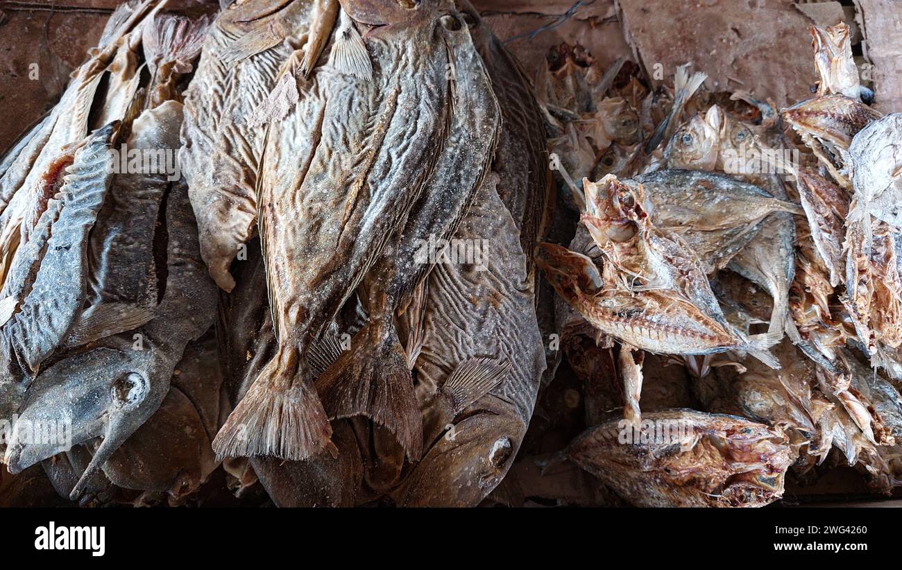Dried fish called bulad or daing displayed at a local market, one of ...