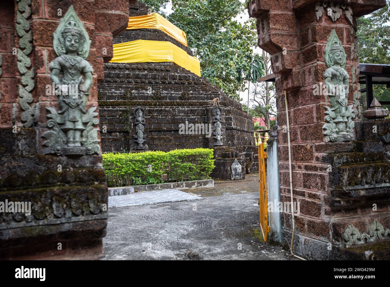 Mae Sai, Thailand. 17th Jan, 2024. A monkey on the stone pagoda of Wat ...