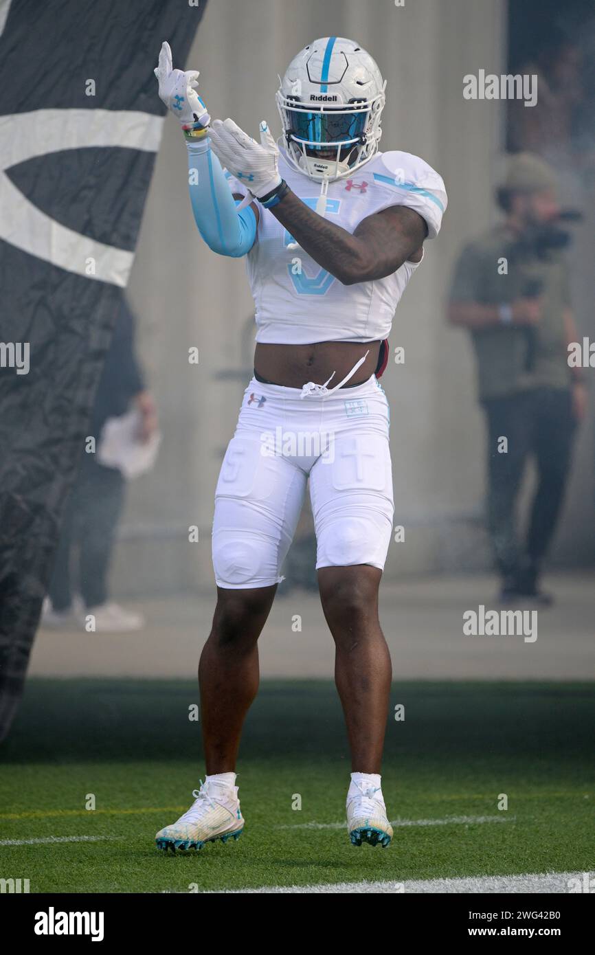 Team Ice wide receiver Braylon Burnside (5) runs onto the field during player introductions ...