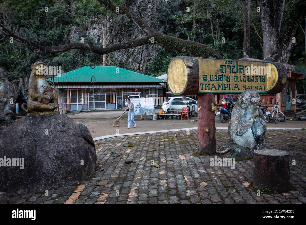 Mae Sai, Thailand. 17th Jan, 2024. A woman cleans up the floor at the ...