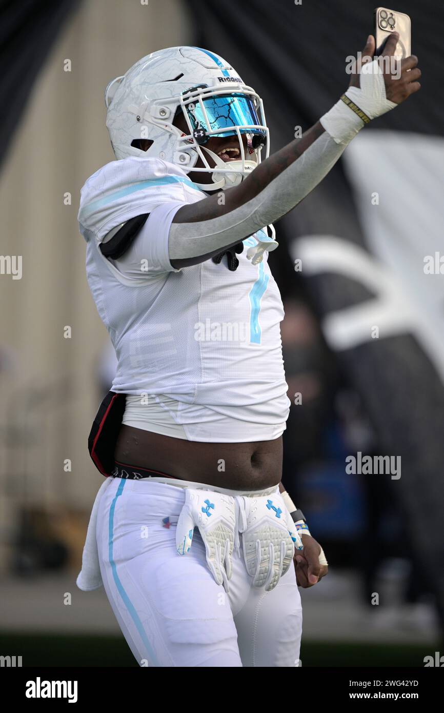 Team Ice tight end Michael Smith (7) runs onto the field during player ...