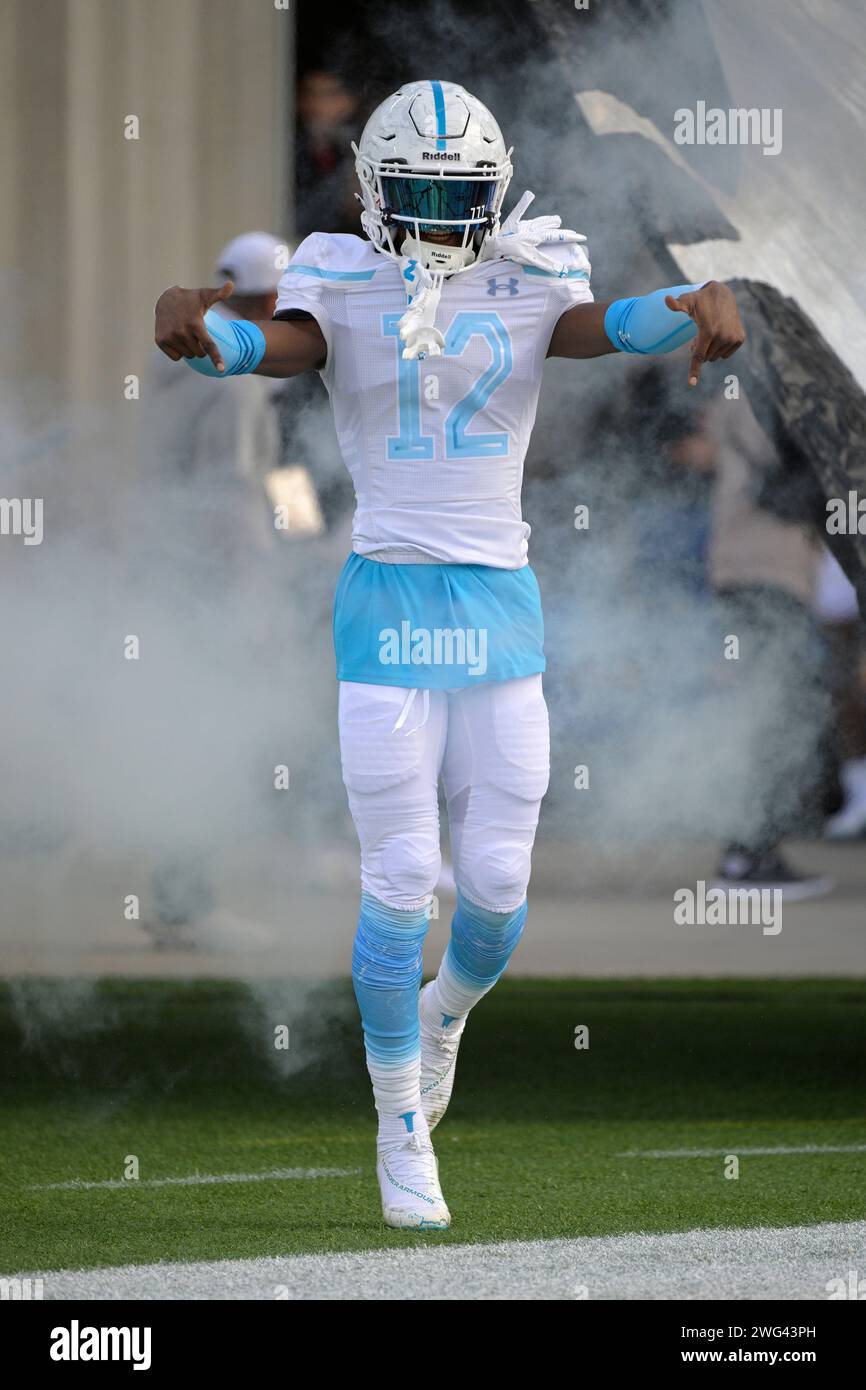 Team Ice wide receiver Mario Craver (12) runs onto the field during ...