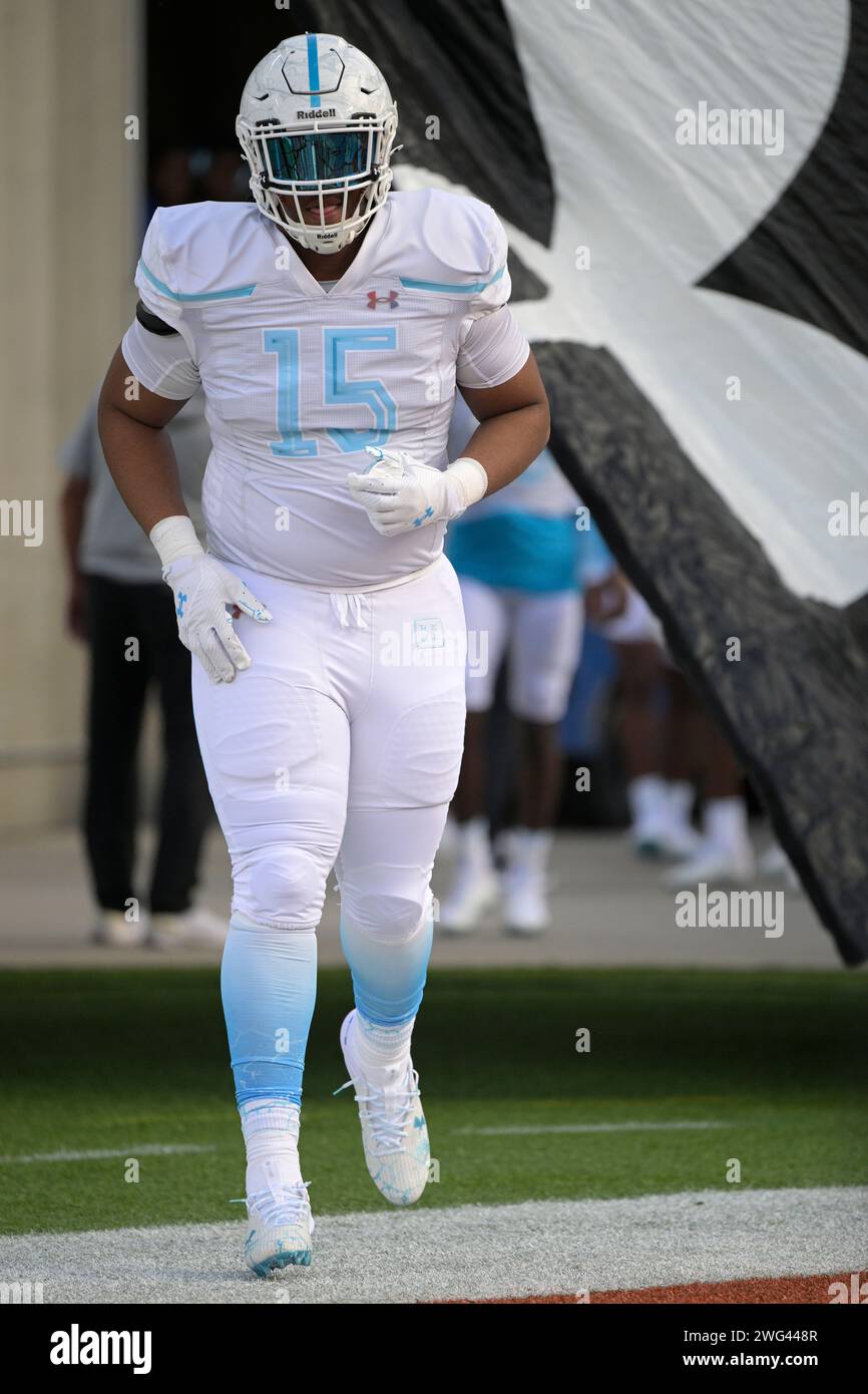 Team Ice defensive lineman Dealyn Evans (15) runs onto the field during ...
