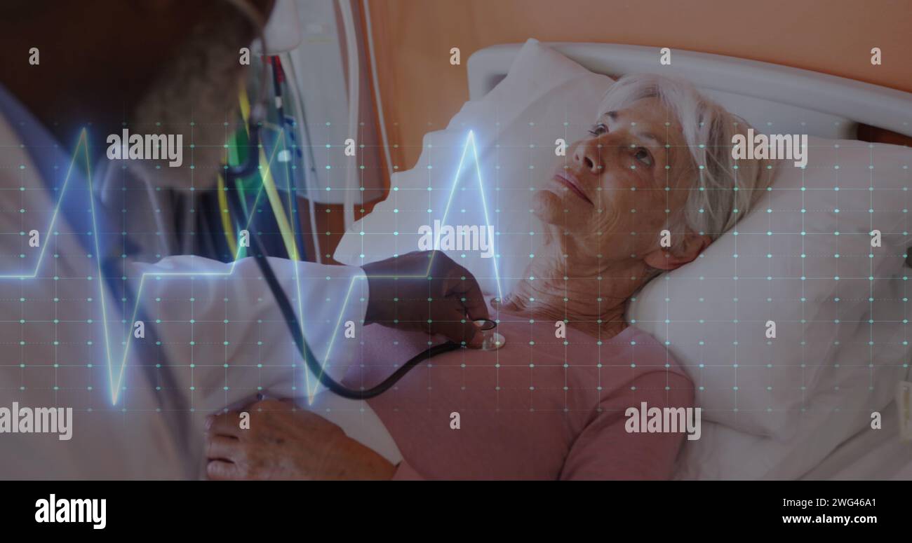 Image of heart data over african american male doctor with female ...