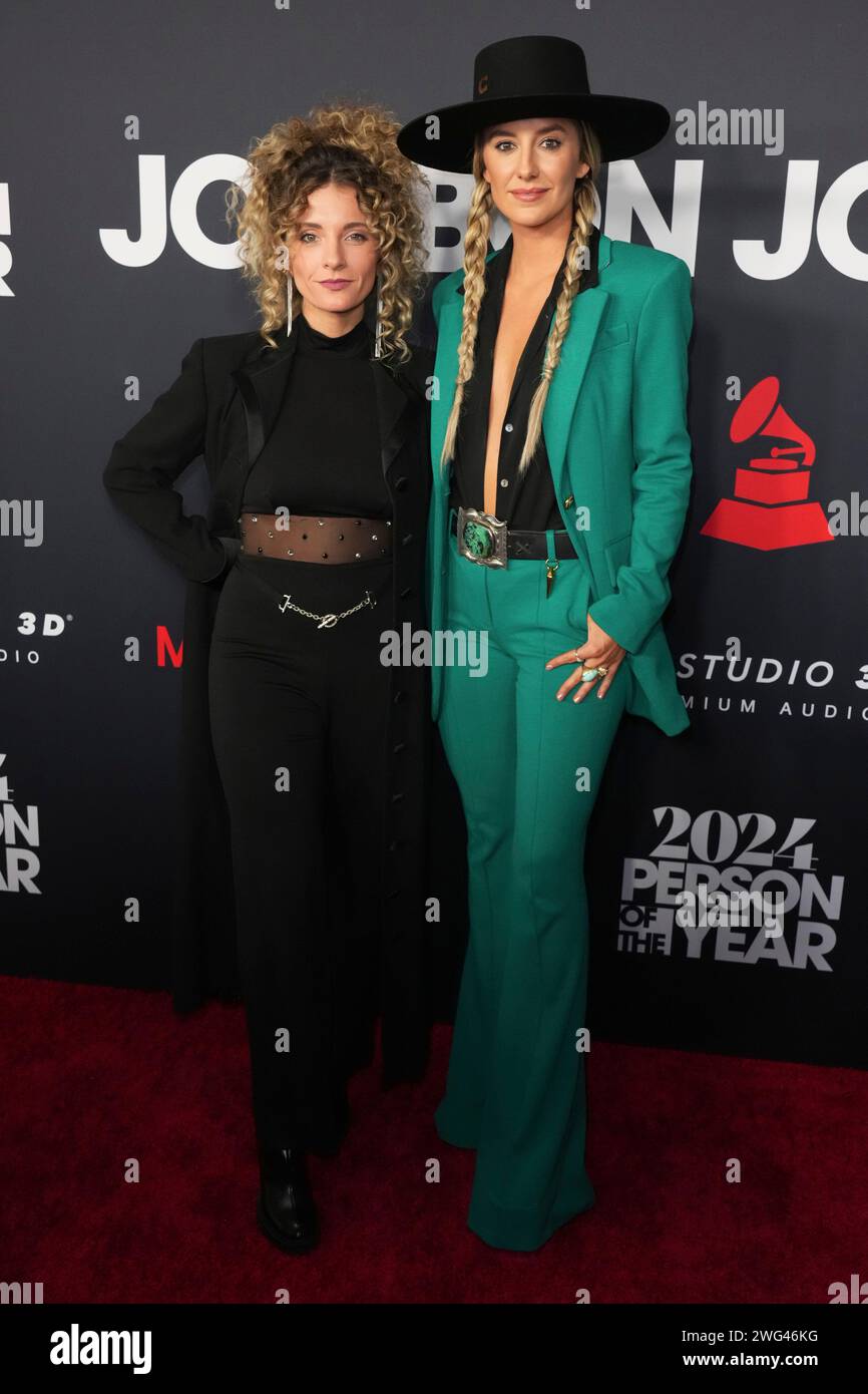 Mandelyn Monchick, left, and Lainey Wilson arrive at MusiCares Person ...