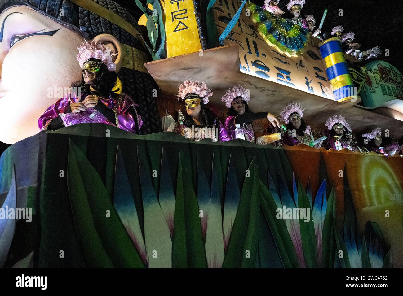 Paradegoers are seen during the Krewe of Cleopatra Mardi Gras Parade in ...