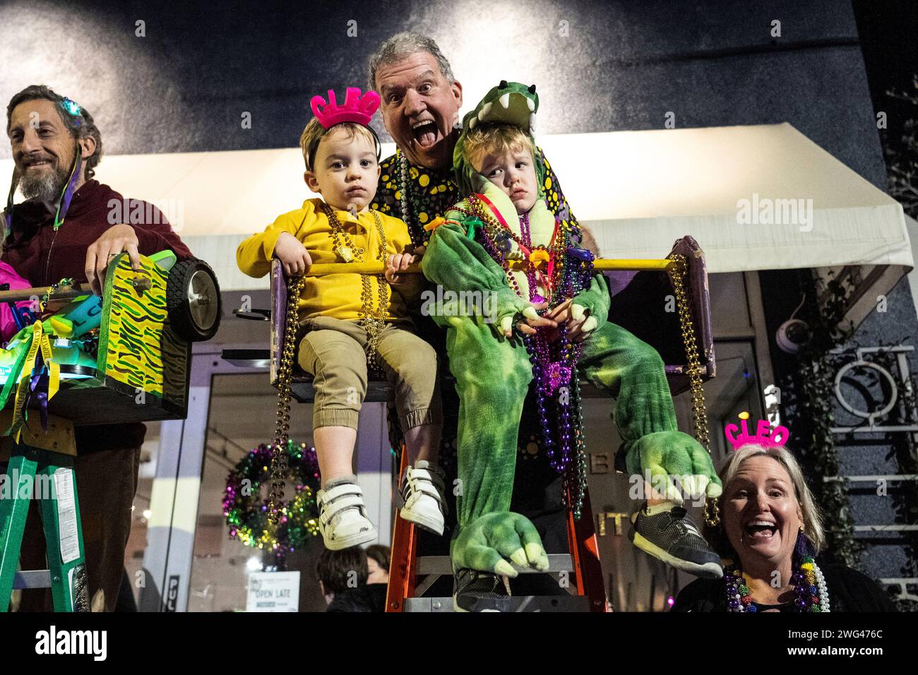 Paradegoers are seen during the Krewe of Cleopatra Mardi Gras Parade in ...