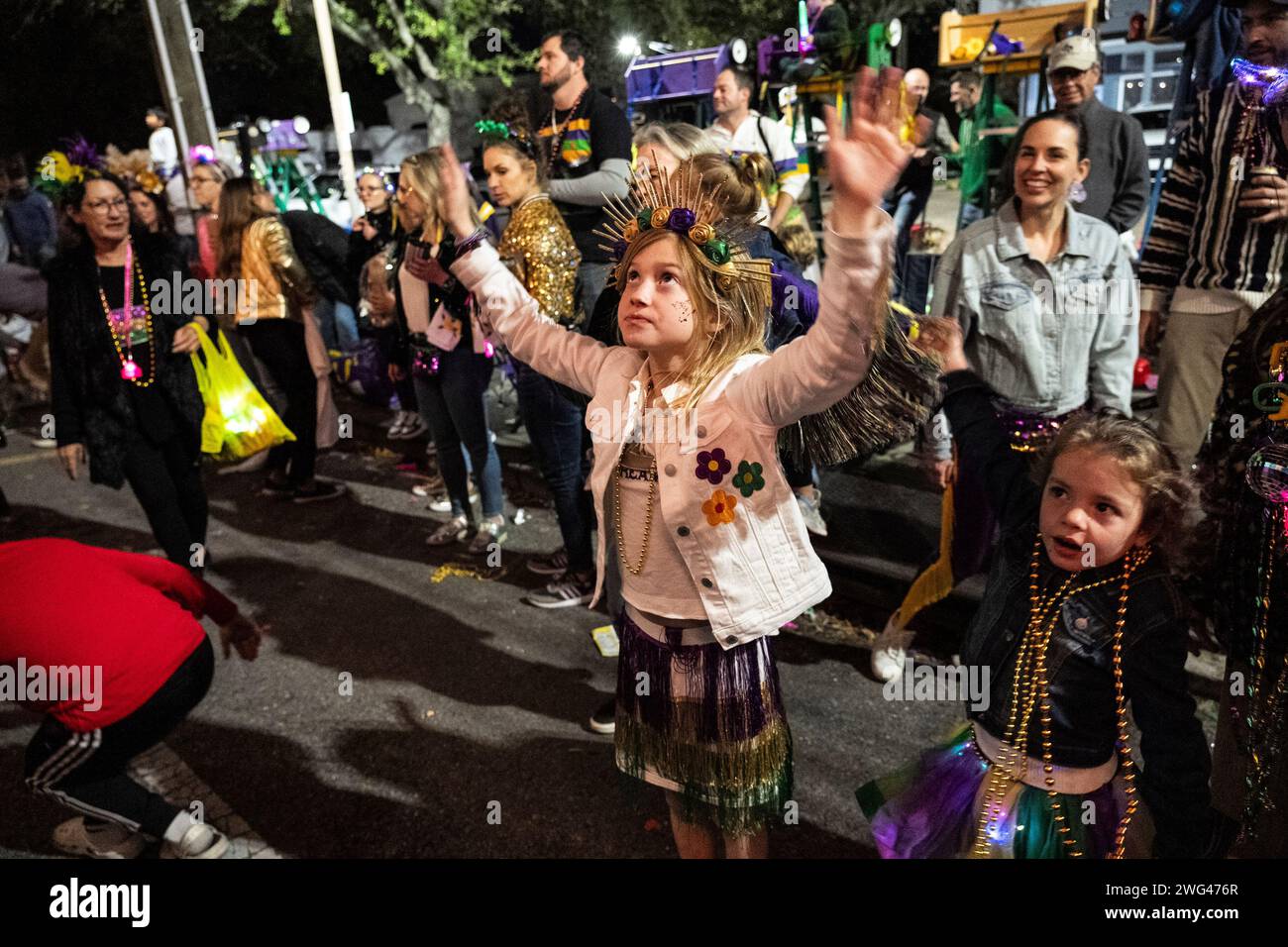 Paradegoers are seen during the Krewe of Cleopatra Mardi Gras Parade in ...