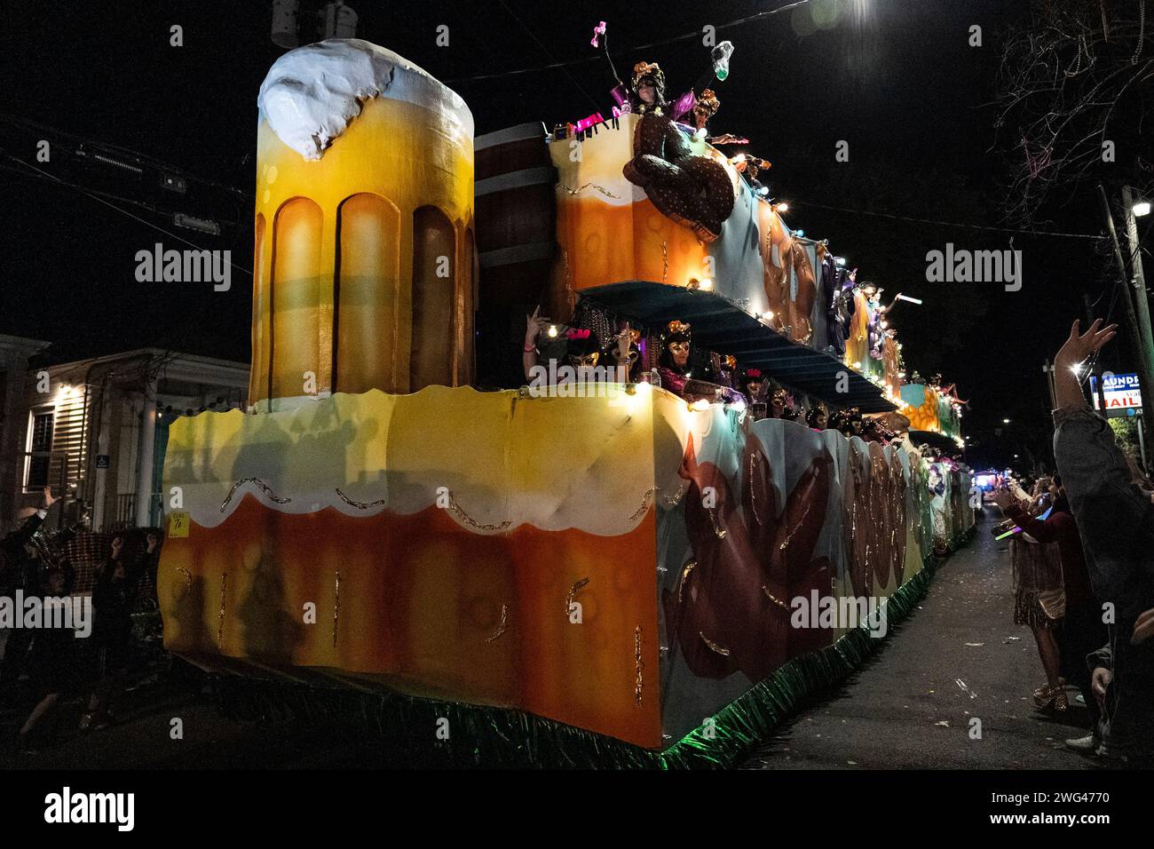 Paradegoers are seen during the Krewe of Cleopatra Mardi Gras Parade in ...