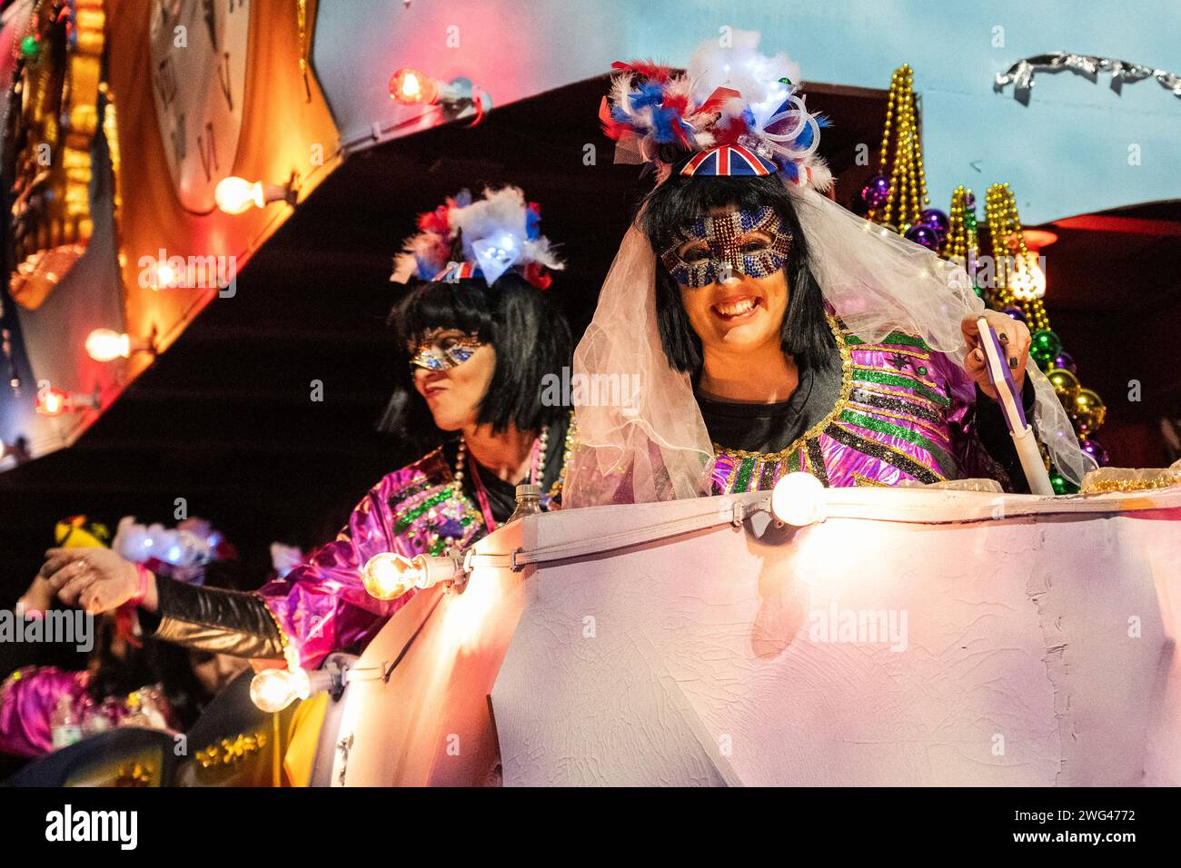 Paradegoers are seen during the Krewe of Cleopatra Mardi Gras Parade in ...