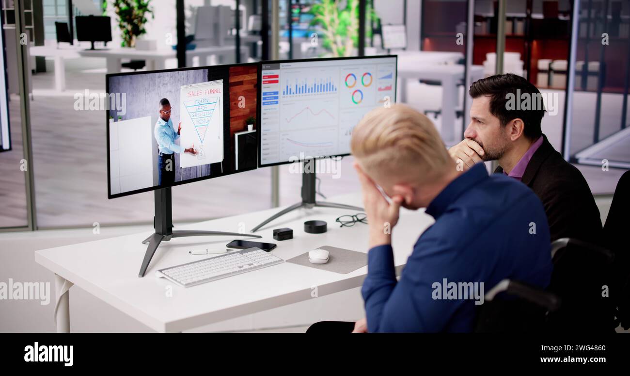 Bored Employee In Video Conference Training Meeting Stock Photo - Alamy