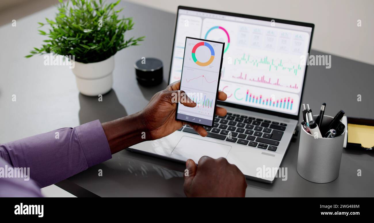 African American Data Analyst Using Data Analytics KPI Dashboard Stock ...