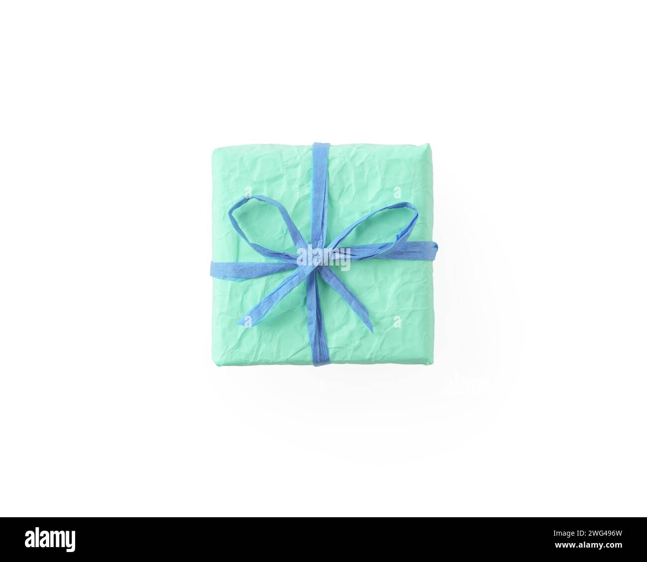 Top view of crumpled paper blue color present box with recycled paper ...