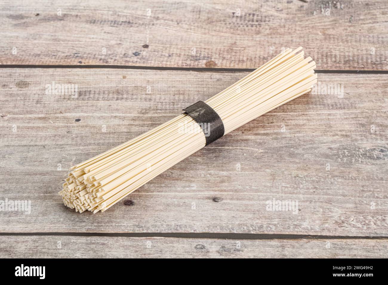 Raw asian udon wheat noodle for cooking Stock Photo - Alamy