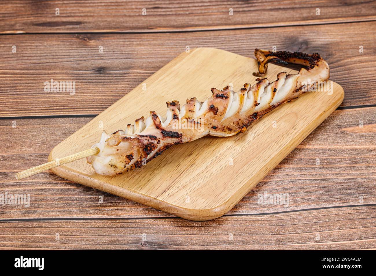 Delicous tasty Grilled octopus tentacle snack Stock Photo - Alamy