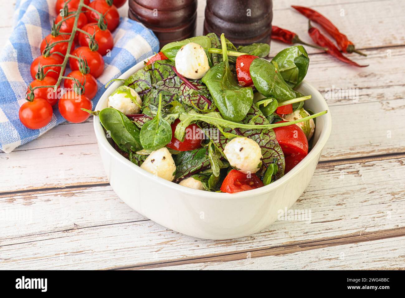 Mix salad with mini mozzarella and tomato Stock Photo - Alamy