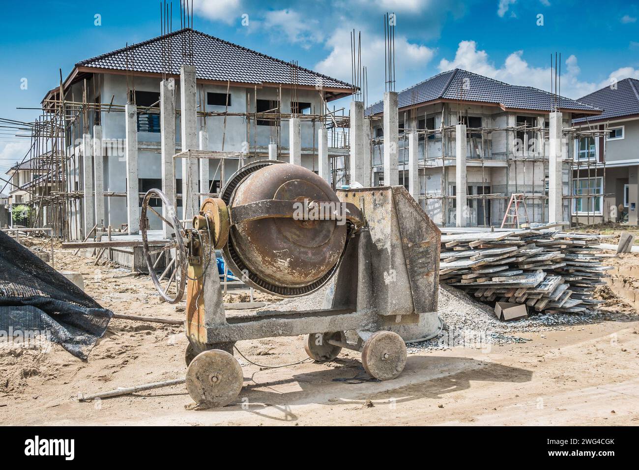 cement concrete mixer machine at new house building construction site ...