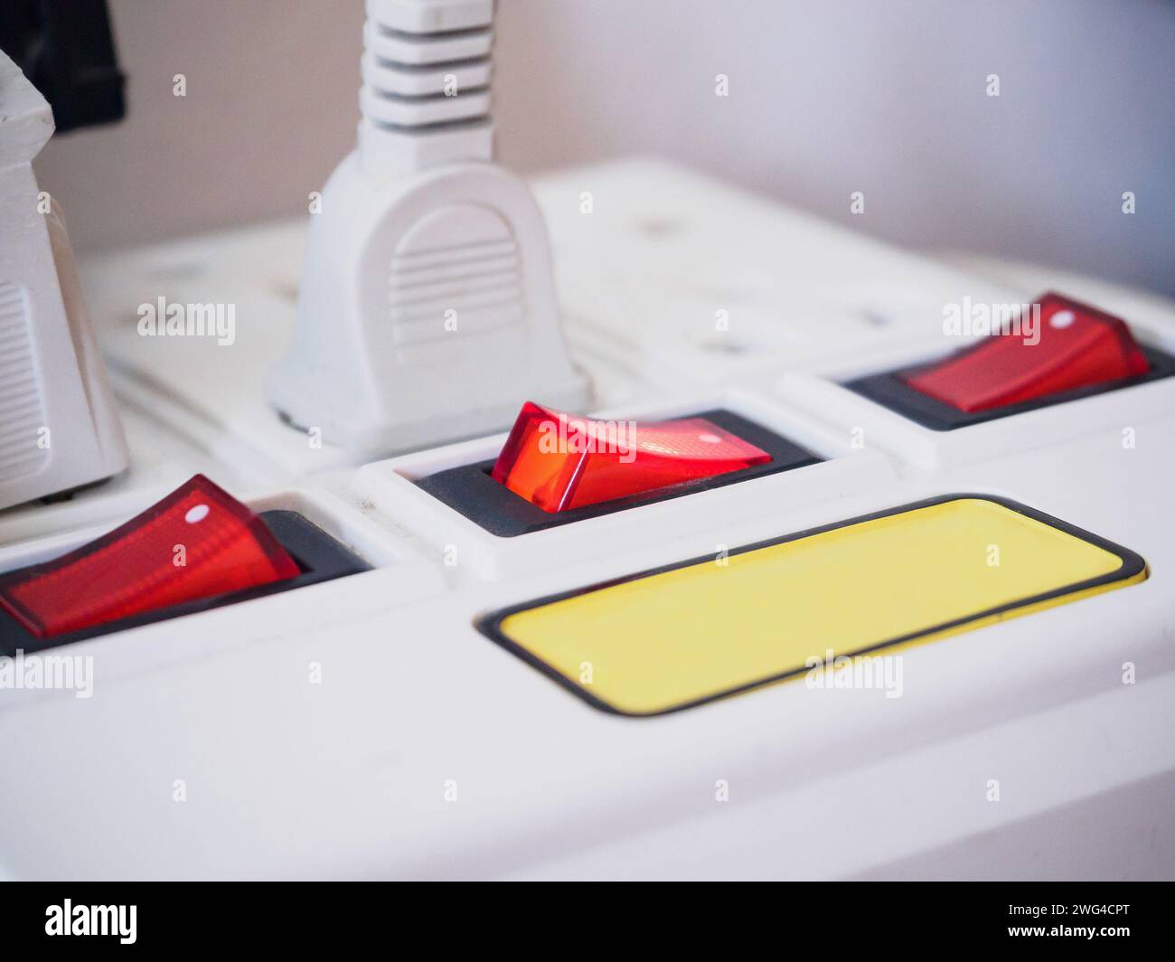Multiple power socket with connected plugs Stock Photo - Alamy