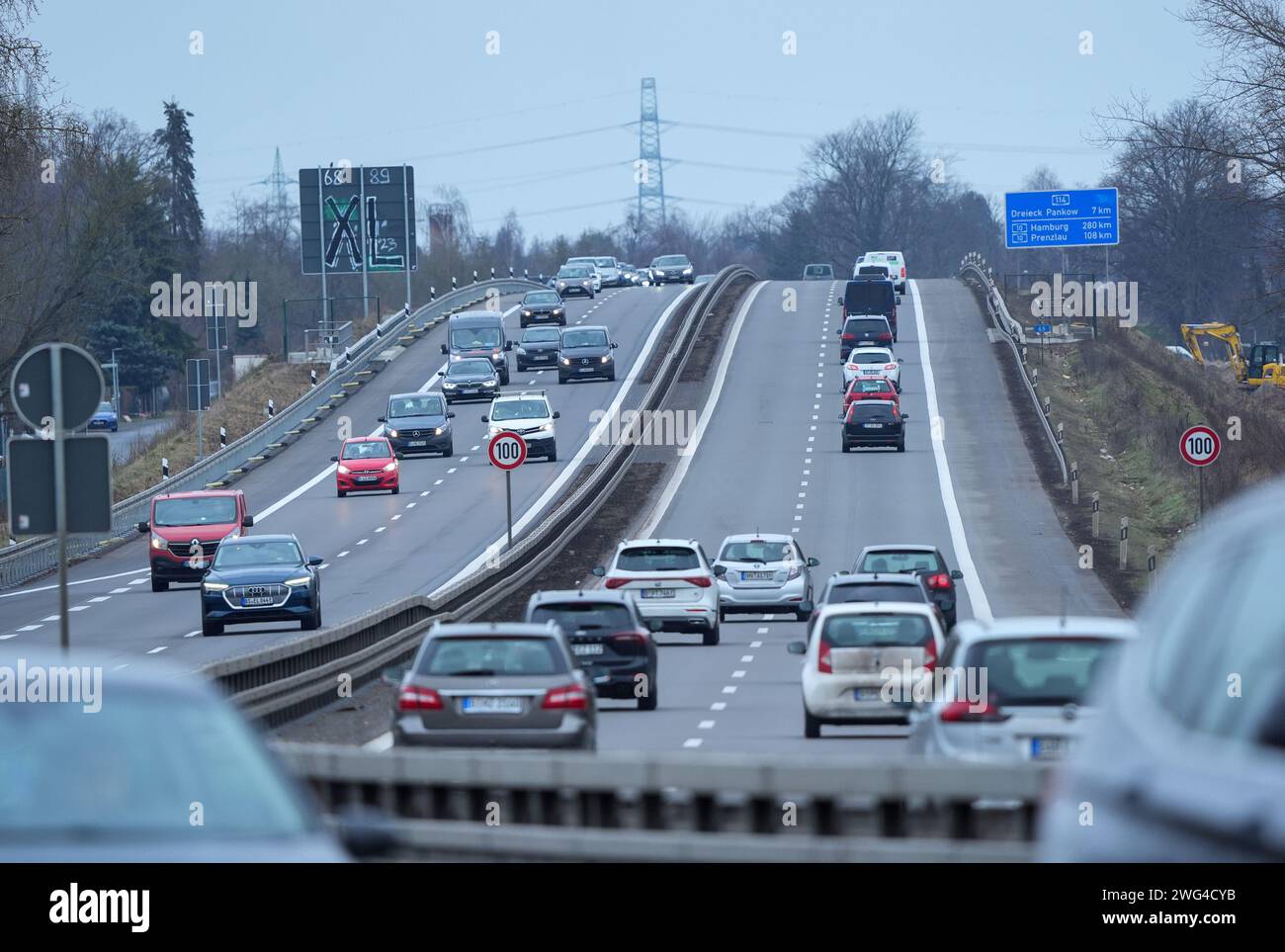 02 February 2024, Berlin: Cars drive on the four lanes of the A 114 ...