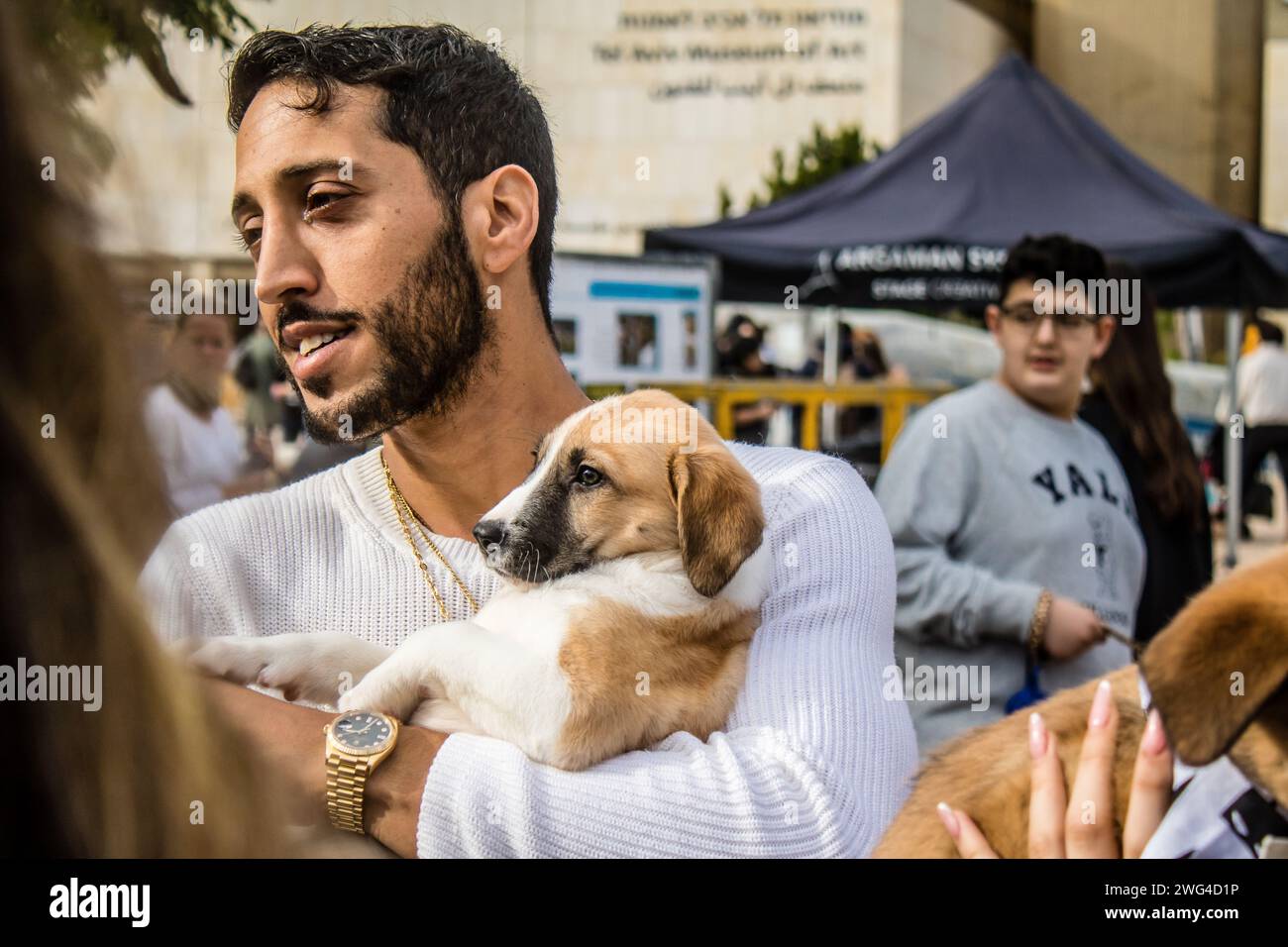 Tel Aviv, Israel – February 2, 2024 New owner of dog from the SOS ...