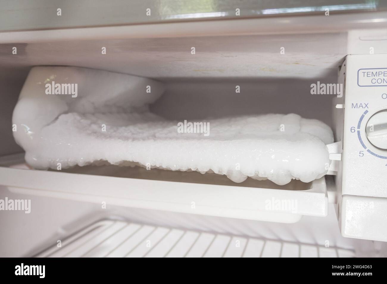 frozen Ice buildup in the freezer of refrigerator Stock Photo - Alamy