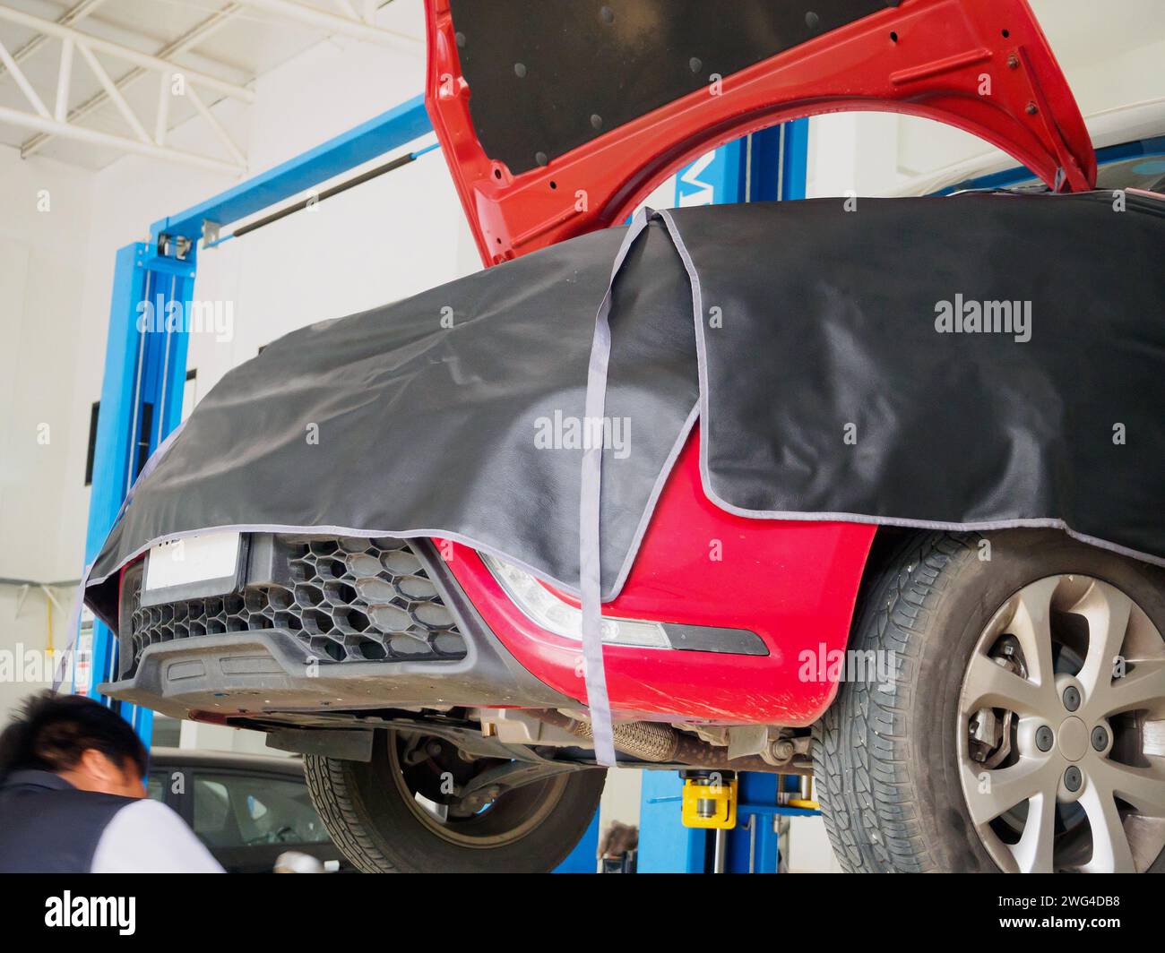 Red car in auto service centre station for repair and maintenance Stock ...