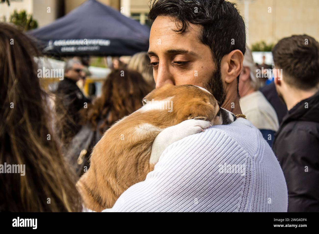 Tel Aviv, Israel – February 2, 2024 New owner of dog from the SOS ...