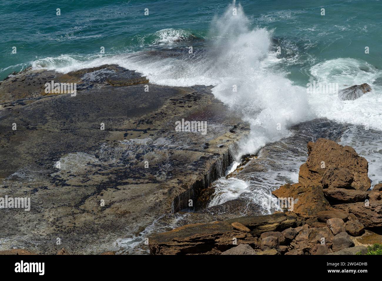 Rocky shore and waves from the cliffs near Portland, Victoria Stock ...