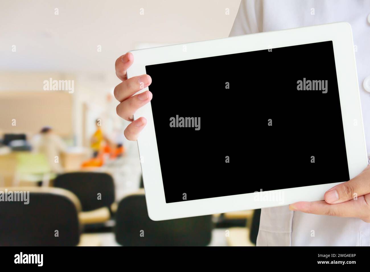 doctor showing tablet computer in the hospital Stock Photo - Alamy