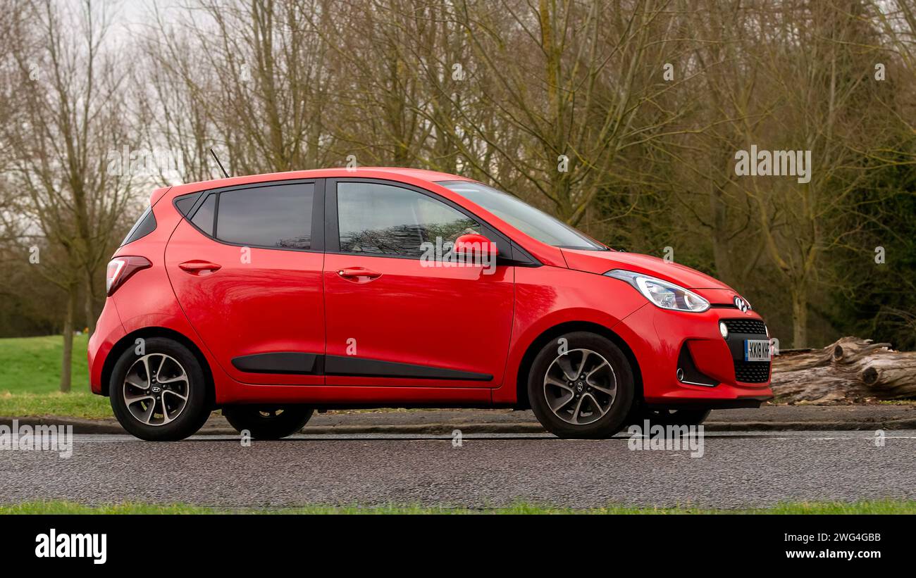 Milton Keynes,UK-Feb 2nd 2024: 2018 red Hyundai i10 car driving on an ...