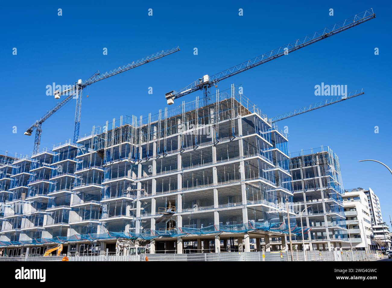 Construction site with cranes for residential buildings seen in ...