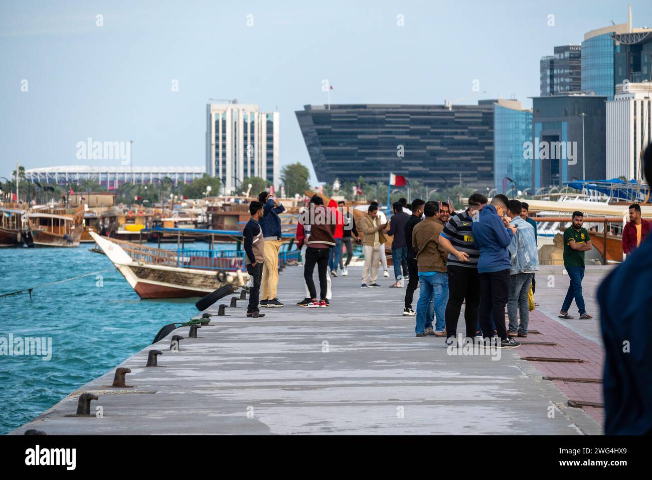 Doha, Qatar - February 02, 2024: People enjoying holiday cold weather ...
