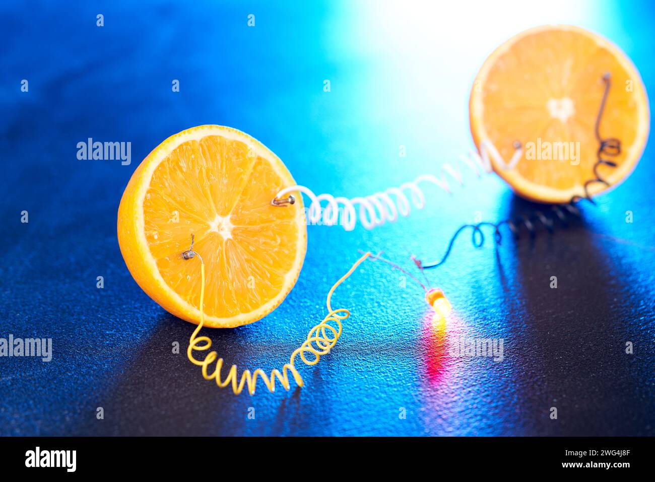 Free energy electricity generator using oranges blue light Stock Photo ...