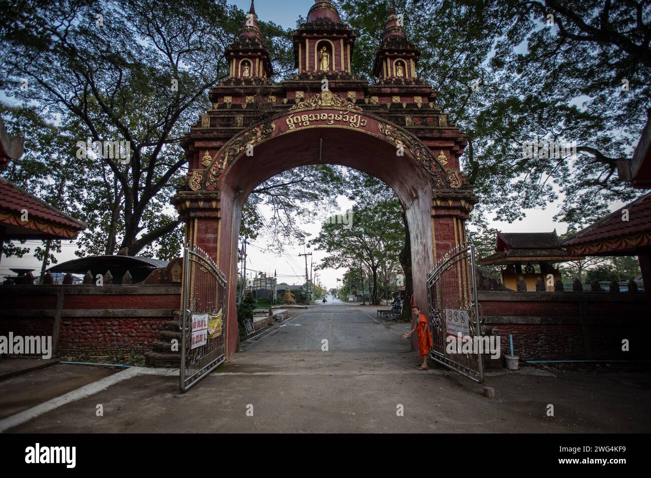 The entrance gate of the Wat Tham Pla Temple. Wat Tham Pla (Cave Fish ...