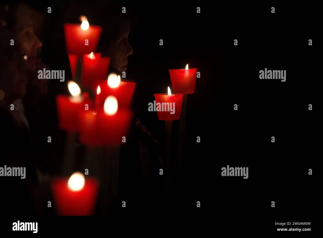 Vatican City, Vatican, 2 february, 2024. Faithful hold candles during ...