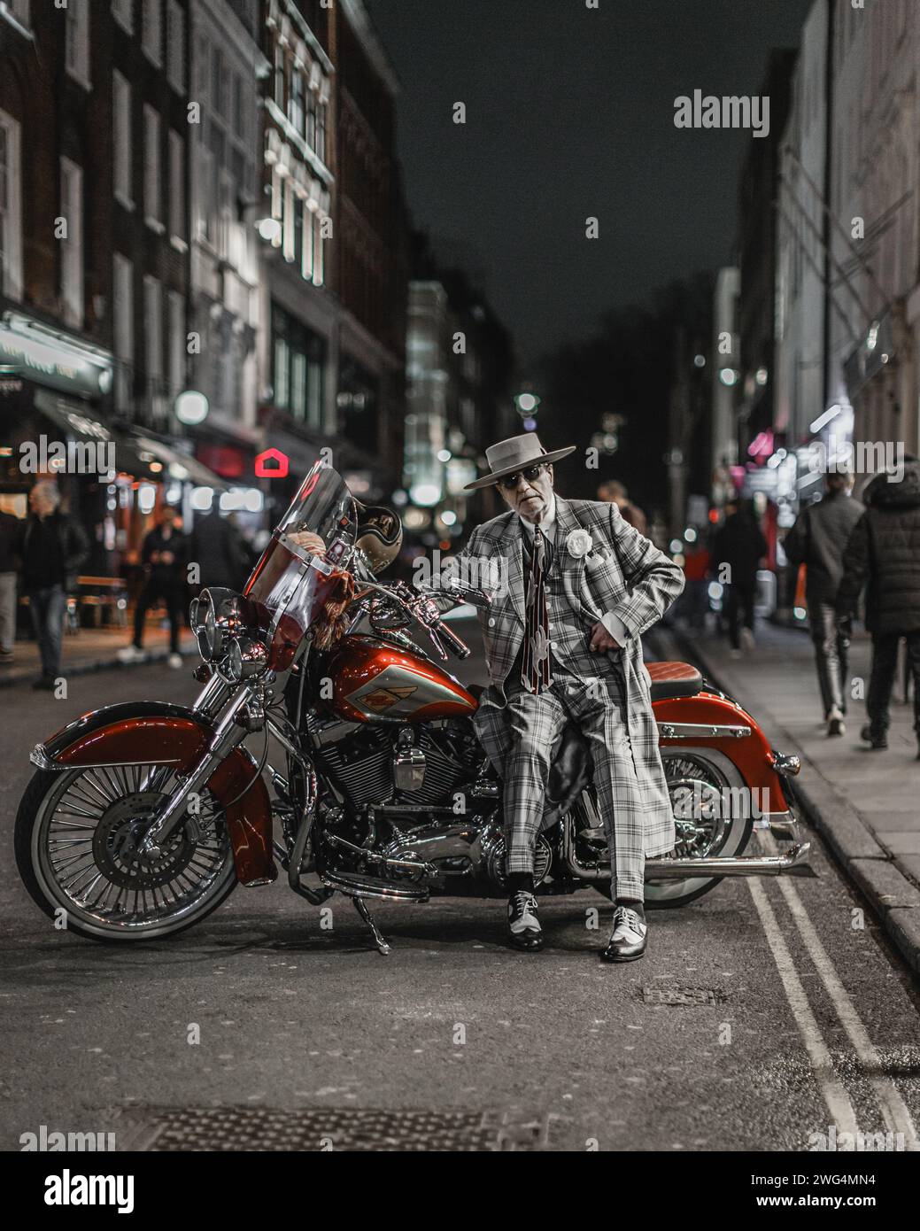 Artist George Skeggs poses on a motorbike in Soho, London Stock Photo ...
