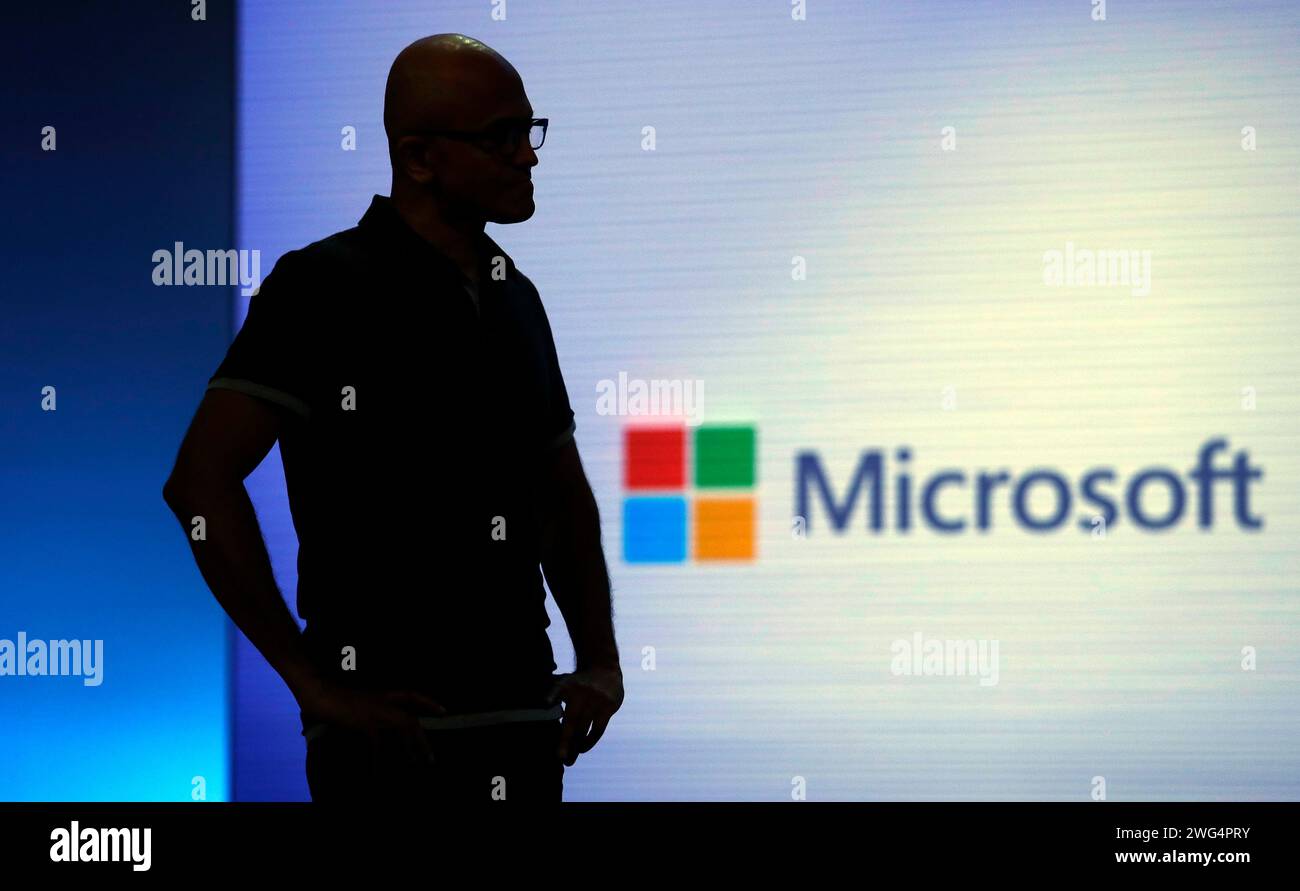 FILE- Microsoft CEO Satya Nadella pauses during a video presentation at ...