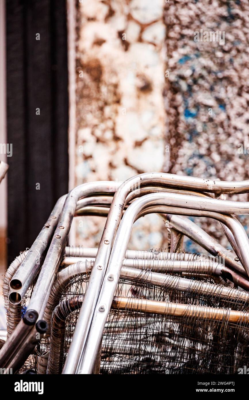 Burned chairs in the old town of Villajoyosa Stock Photo - Alamy