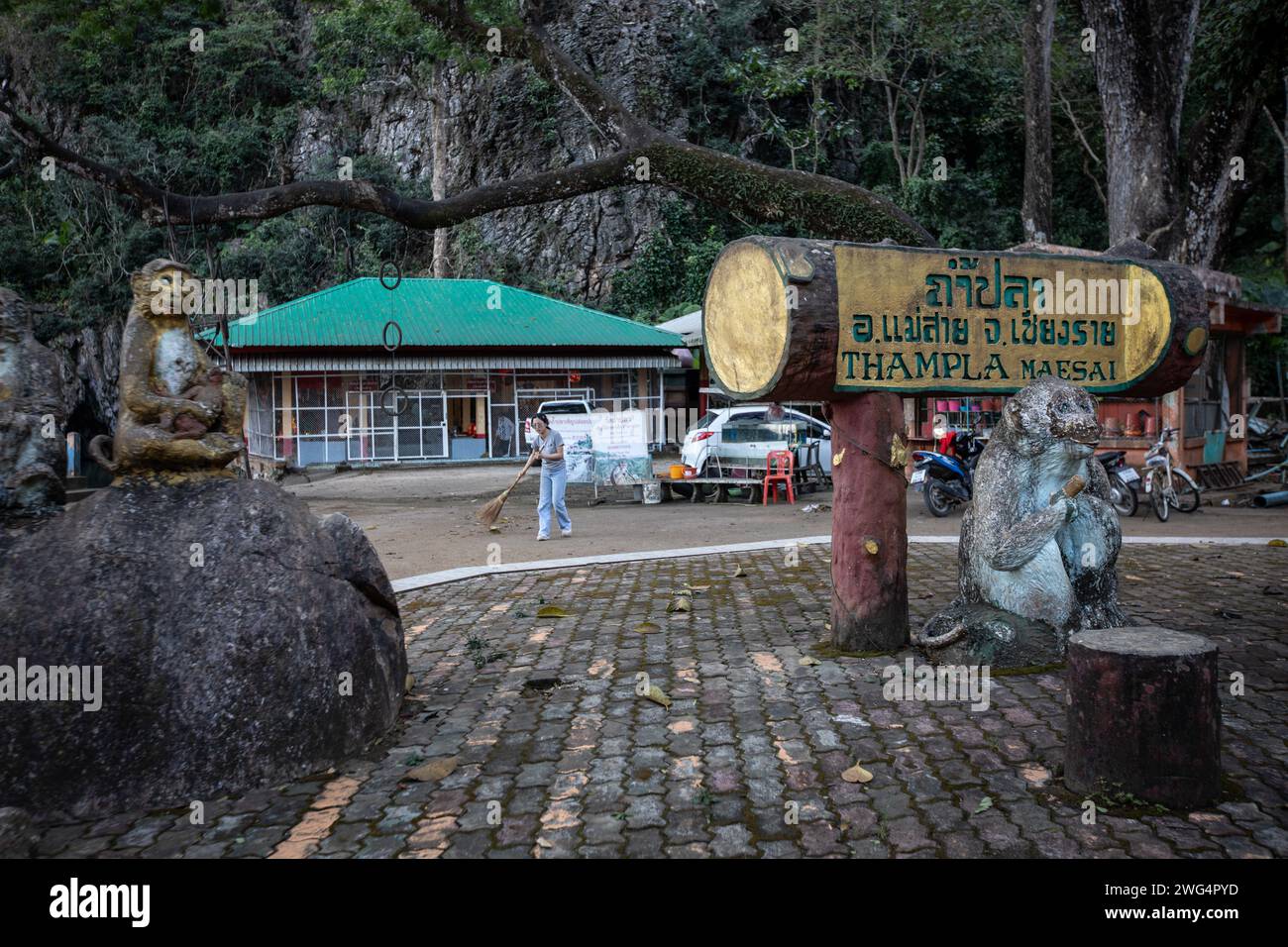 January 17, 2024, Mae Sai, Chiang Rai, Thailand: A woman cleans up the ...