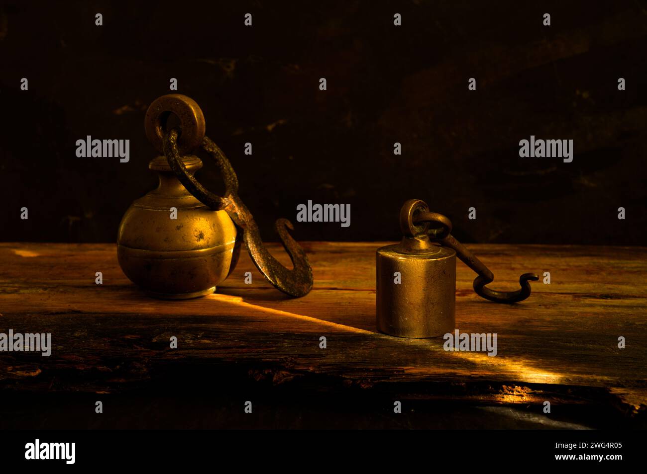 still life with antique brass scale weights Stock Photo - Alamy