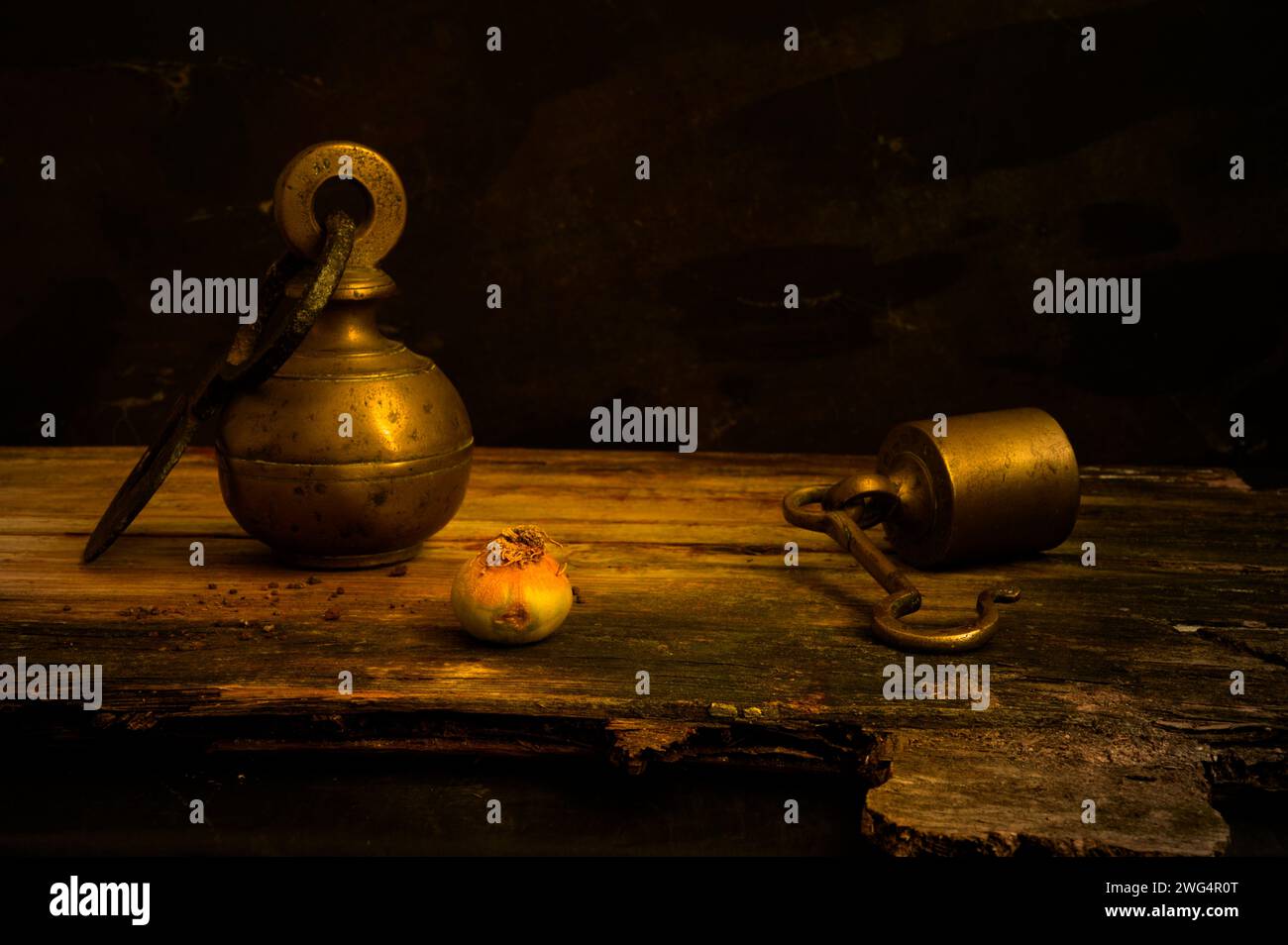 still life with antique brass scale weights Stock Photo - Alamy