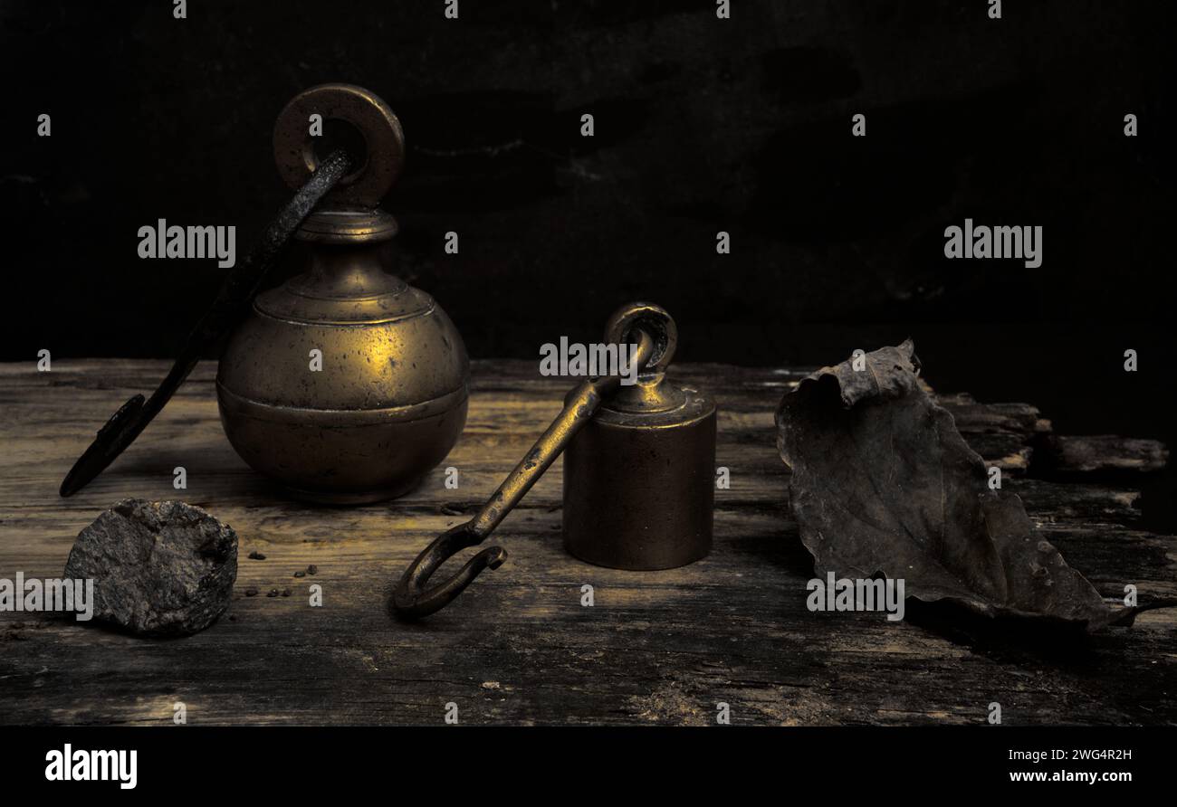 still life with antique brass scale weights Stock Photo - Alamy