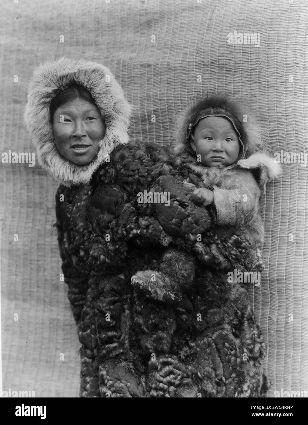 Woman and child, Nunivak, c1929. Child is Joe Moses Stock Photo - Alamy